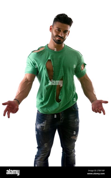 Attractive Muscular Strong Man In Ripped T Shirt Isolated On White