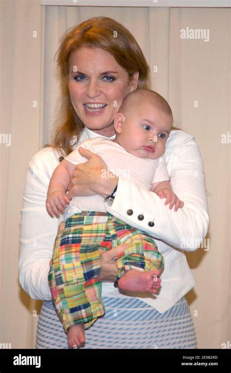 Sarah Ferguson The Duchess Of York Poses With A Young Fan At Her New Book Signing Little Red