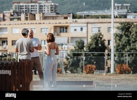 Architects Discussing Analyzing Blueprint On Table Construction Engineers Planning Modern