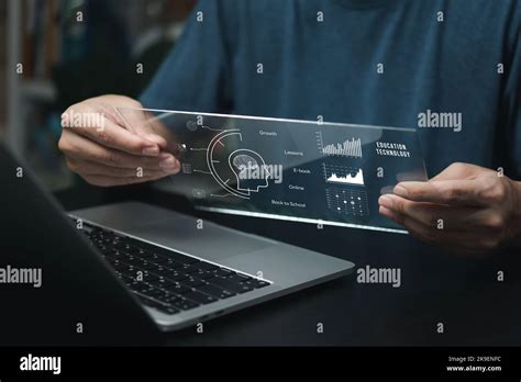 Businessman Using Laptop Computer Icon Virtual Screen Education Online And E Learning On Desk