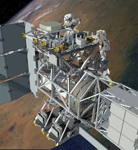 ESA Astronauts Working At An External Payload Site On The ISS Truss Assembly