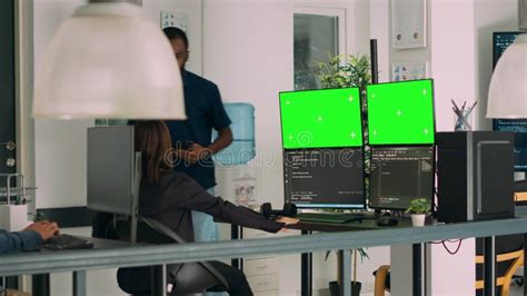 Asian System Engineer Using Html Script Code And Greenscreen On Multiple Monitors Stock Footage