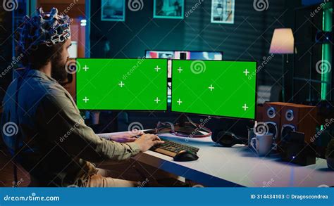 Computer Engineer Starting Mind Upload Process Using Green Screen Pc