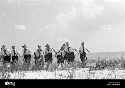 Girls Play On The Beach In Karlshagen At The Summer Camp Of The Bmd