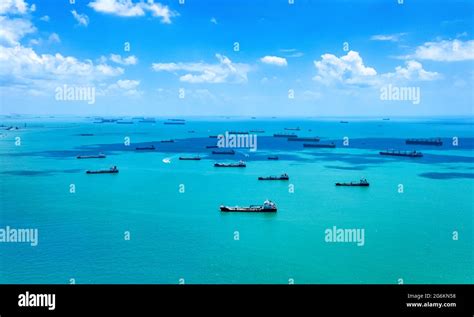 Aerial View Of Container Ships In Singapore Strait Airplane Shot Cargo Ships Anchored In The