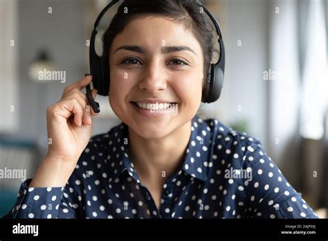Smiling Indian Girl Professional Wear Headset Look At Camera Webcam
