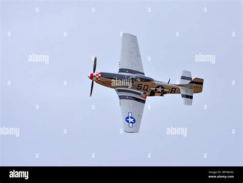 Classic North American P 51 Mustang Fighter Aircraft In Flight Stock