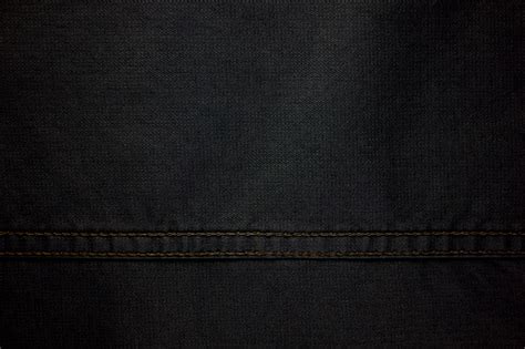 데님의 감촉은 사이드 더블 솔기와 회색입니다 데님 직물의 배경에 스레드 스티치 복사할 장소입니다 디자인에 대한 추상적 인 배경과 질감 0명에 대한 스톡 사진 및 기타 이미지