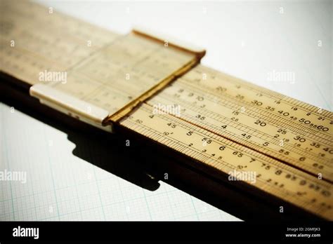 Logarithmic Slide Rule On Piece Of Graph Paper Stock Photo Alamy