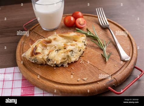Traditional Balkan Breakfast Burek Pie With Cheese And Spinach Served