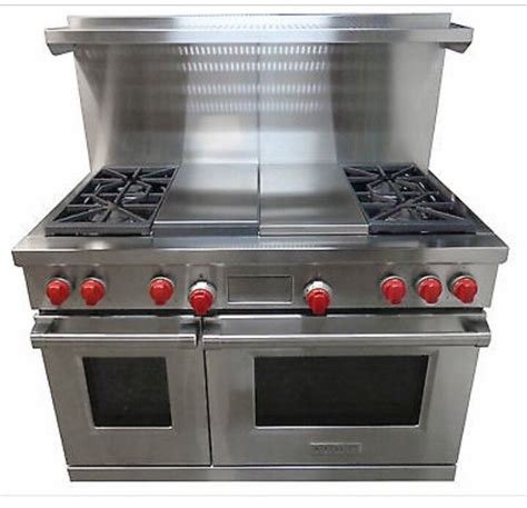 Stainless Steel Stove With Red Knobs