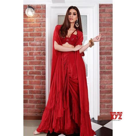 Actress Kriti Sanon Stills In A Bold Cherry Dress Social News Xyz