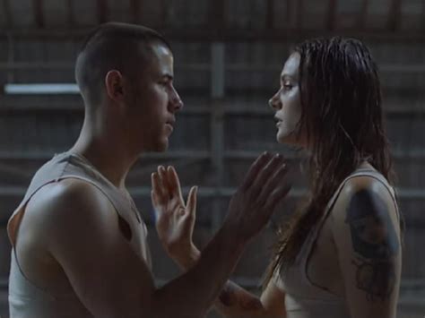 Watch Nick Jonas Gets His Clothes Ripped Off In New Music Video