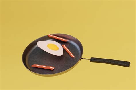 노란색 배경의 팬에 스크램블 드 에그와 소시지의 아침 식사 3d 렌더링 고기에 대한 스톡 사진 및 기타 이미지 고기 구이 굽기 Istock