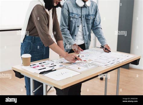 Close Up Ux Developer And Ui Designer Brainstorming Interface Wireframe Designcreative Digital