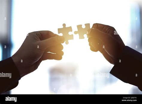 2 Puzzle Pieces Fit Together