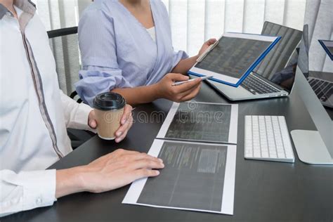 Team Of Programmers Working With Computer Programming Professional Development And Coding