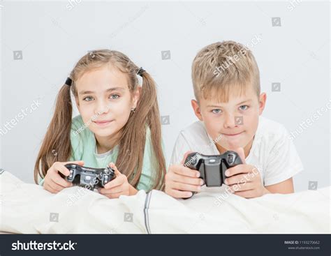 Friendly Brother Sister Playing Video Games Stock Photo Shutterstock