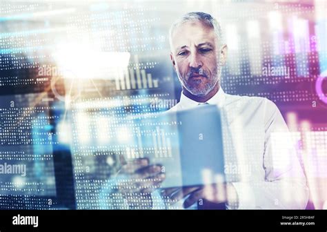 maximising success with the help of technology a mature businessman working on programming code