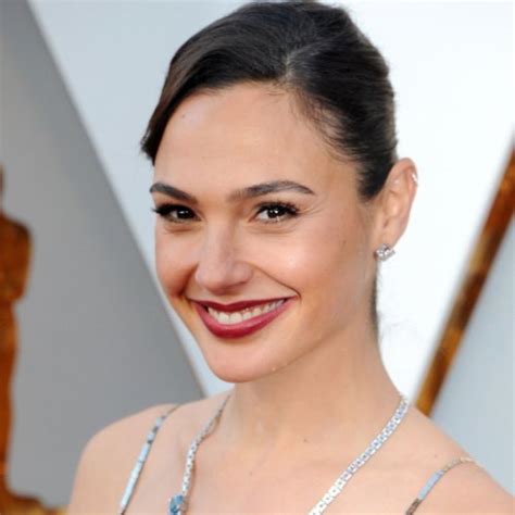 Gal Gadot Flaunts Her Long Legs While Posing In A Tiny Black Bathing