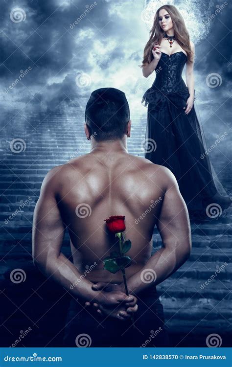 Romantic Couple Man Give Flower To Beautiful Woman Lover Athletic Holding Rose Stock Photo