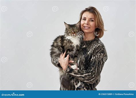 European Woman Holding Maine Coon Cat In Hands Stock Image Image Of