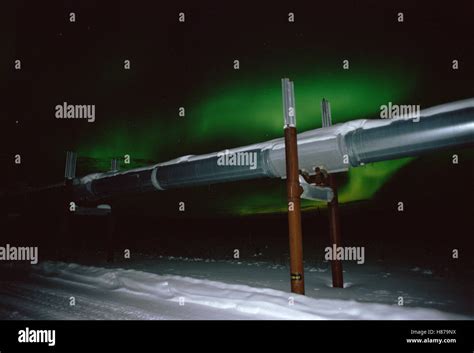 Aurora Borealis Over Pipeline Haul Road Dalton Highway Alaska Stock