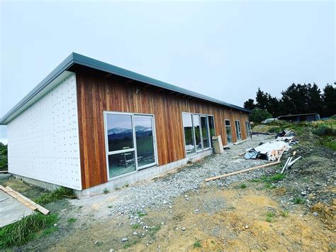 Three Bedroom Home With Lma Reclaimed Timber And Rockcote Cladding — Rn Building
