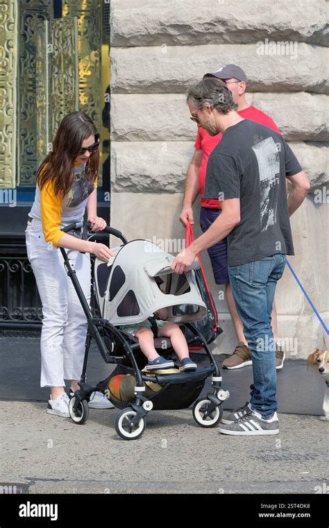 Actress Anne Hathaway Walks In Soho With Her Husband Adam Shulman And Her Son Jonathan Shulman