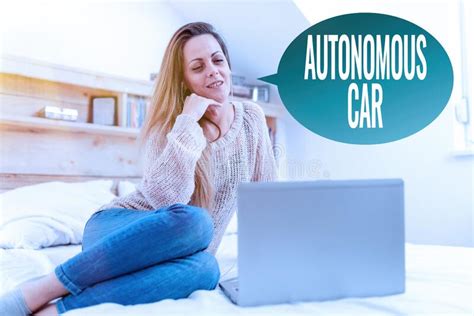 Sign Displaying Autonomous Car Internet Concept Vehicle That Can Guide Itself Without Human