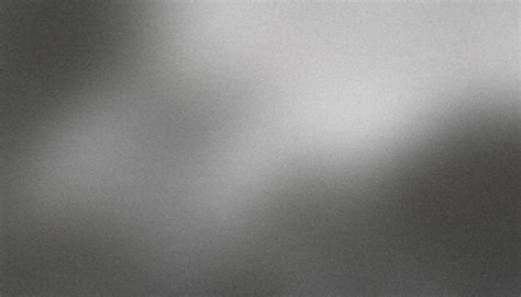 Metallic Surface With Grainy Texture Reflecting Light To Create A Cold Background Premium Ai