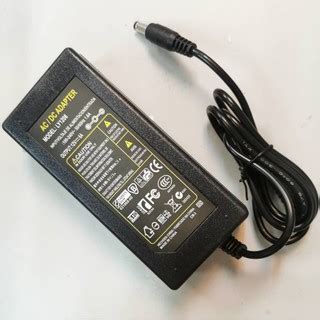 AC DC POWER ADAPTER INPUT V HZ A OUTPUT V A WITH UK PLUG CABLE Shopee Malaysia