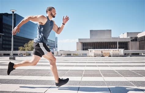 Premium Photo Fitness Exercise And Man Running In City For Health And