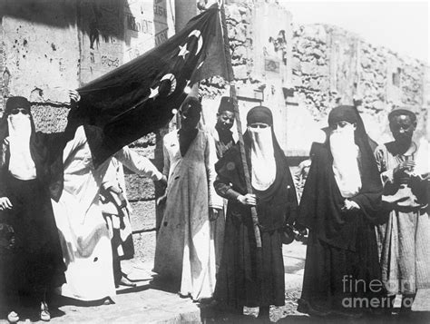 Egyptian Suffragists Displaying Flag By Bettmann