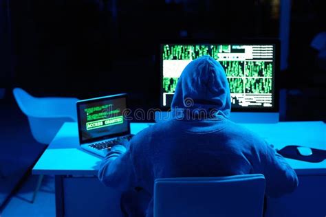 Back Person Or Hacker With Laptop In Dark For Cybercrime Malware Or Phishing For Stealing
