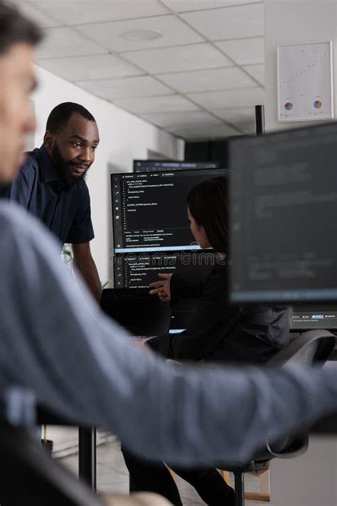 Software Programers Brainstorming Ideas To Write Html Code Stock Image