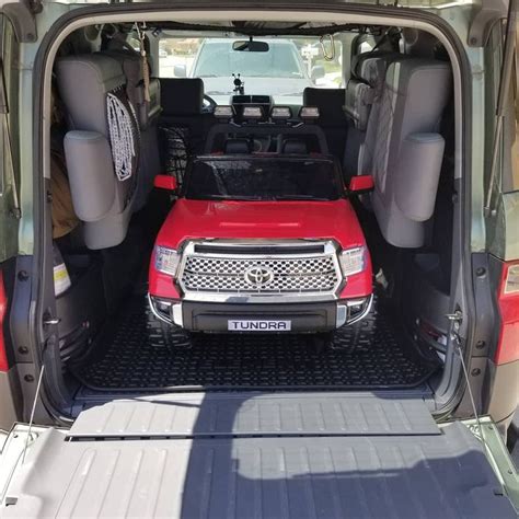 Interior Of Red Honda Element Suv With Seats Folded Down