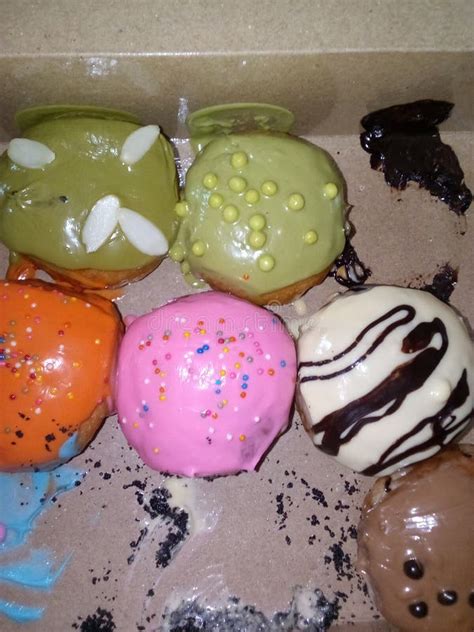 Vanilla Chocolate Matcha Strawberry Flavored Donuts Stock Image