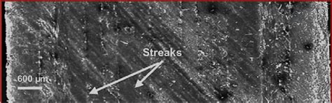 Sem Surface Micrograph Of Cfrp Machined By Abrasive Diamond Saw Showing Download Scientific