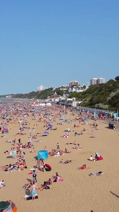 Bikini Girls And Half Naked People At Bournemouth Sandy Beach Uk Shorts