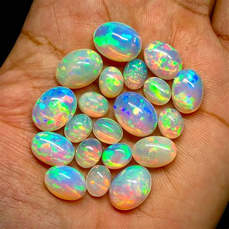 555 Cts Awesome Natural Ethiopian Opal Oval Cabochon Welo Play Colors