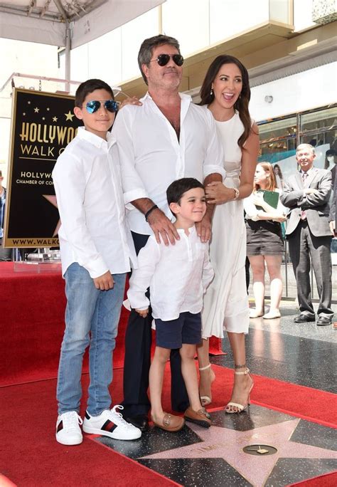 Simon Cowell And His Son Eric Artofit