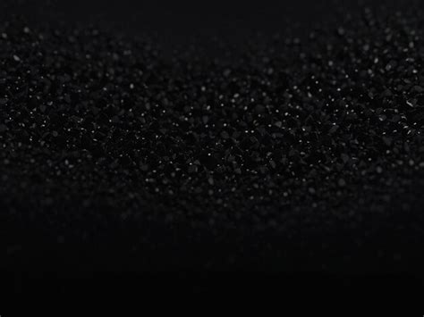 A Black Background With A Lot Of Tiny Specks Of Water On It Premium Ai Generated Image