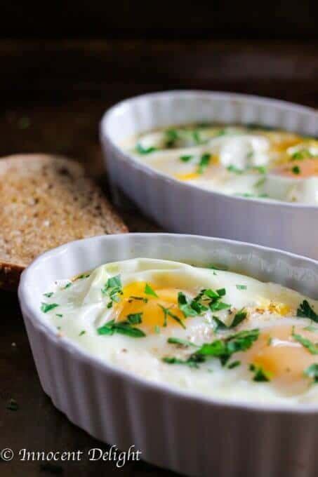 Baked Eggs With Tomatoes And Feta Cheese Eating European