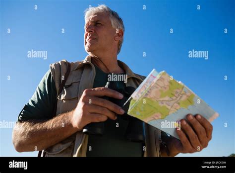 Man Holding Map Hi Res Stock Photography And Images Alamy
