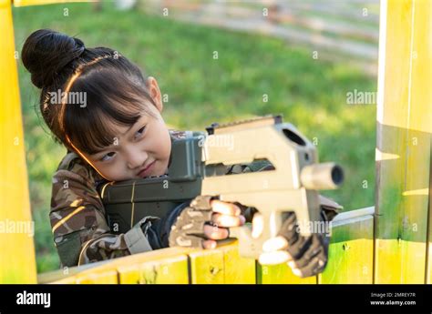 Happy Girl Playing Cs Stock Photo Alamy