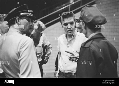 Elvis Presley Speaks With Police Officers At The University Of Dayton
