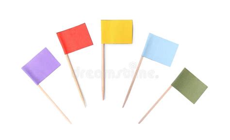 Set Of Toothpicks With Small Colorful Paper Flags On White Background