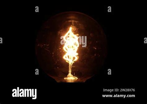 Slow Rotation Of Edison Retro Light Bulb Spinning Vintage Filament