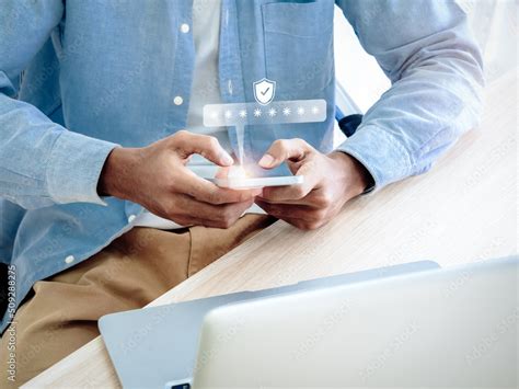 Two Factor Authentication Concept Virtual Safety Shield Icon While Access On Phone With Laptop